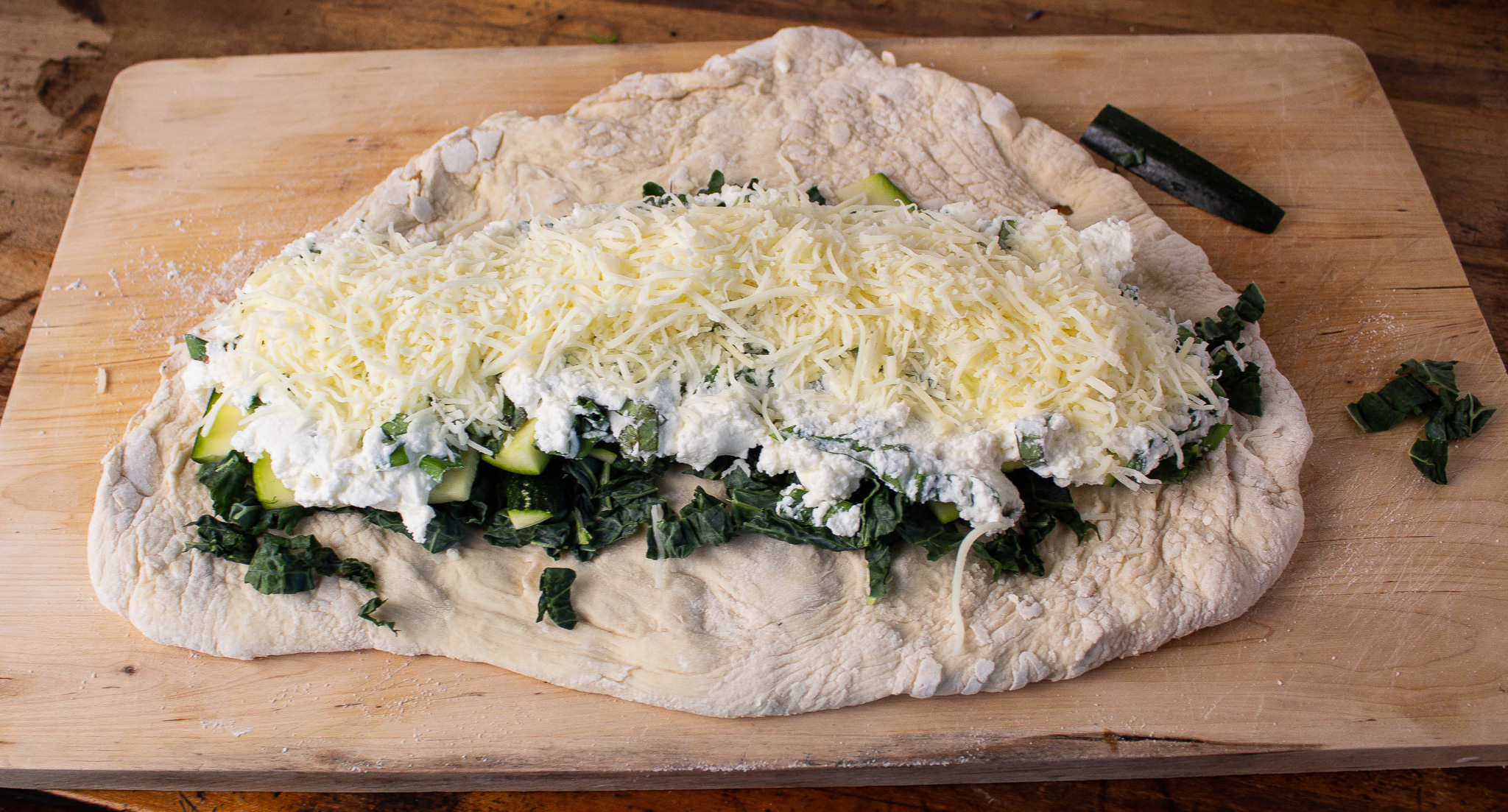 Wild Ramp Ricotta Calzone with Zucchini and Kale - The Sifted Field
